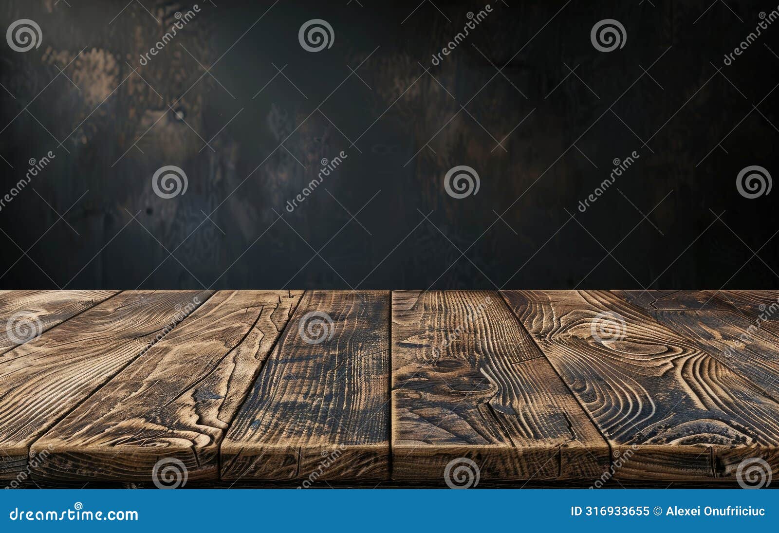 A Rectangular Hardwood Table on a Wooden Floor Against a Black Wall ...