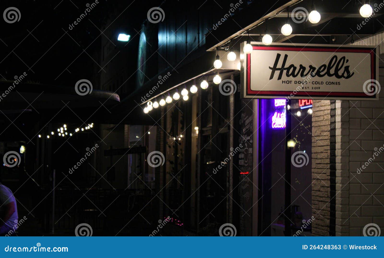 Rectangular Hot Dog Shop Sign with String Light Bulbs Above in the ...