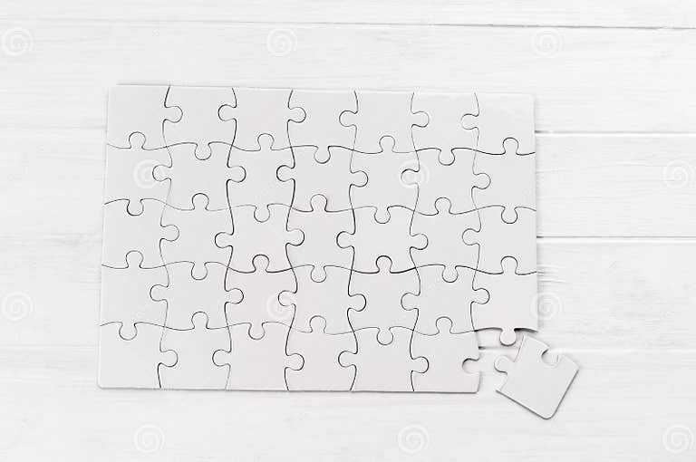 Rectangular jigsaw puzzle stock photo. Image of solution - 218729480