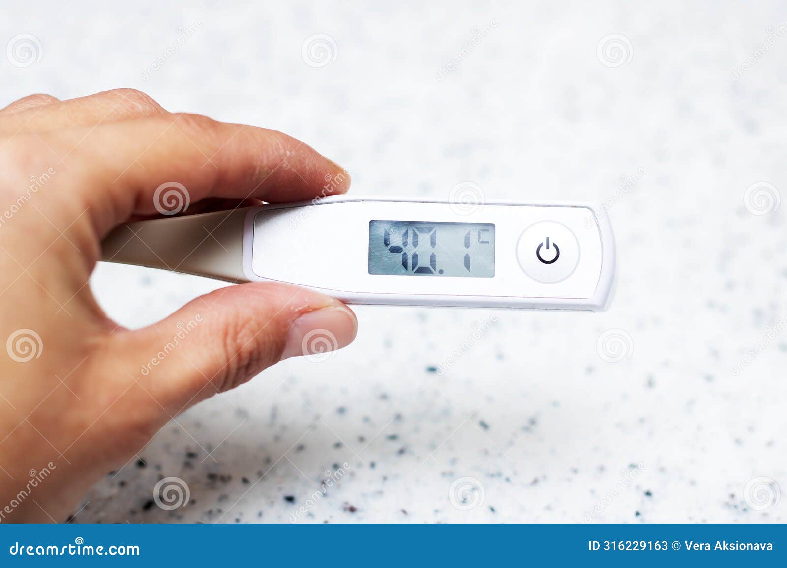 Temperature of 40.1 Shown on Digital Thermometer Held by Hand Stock ...