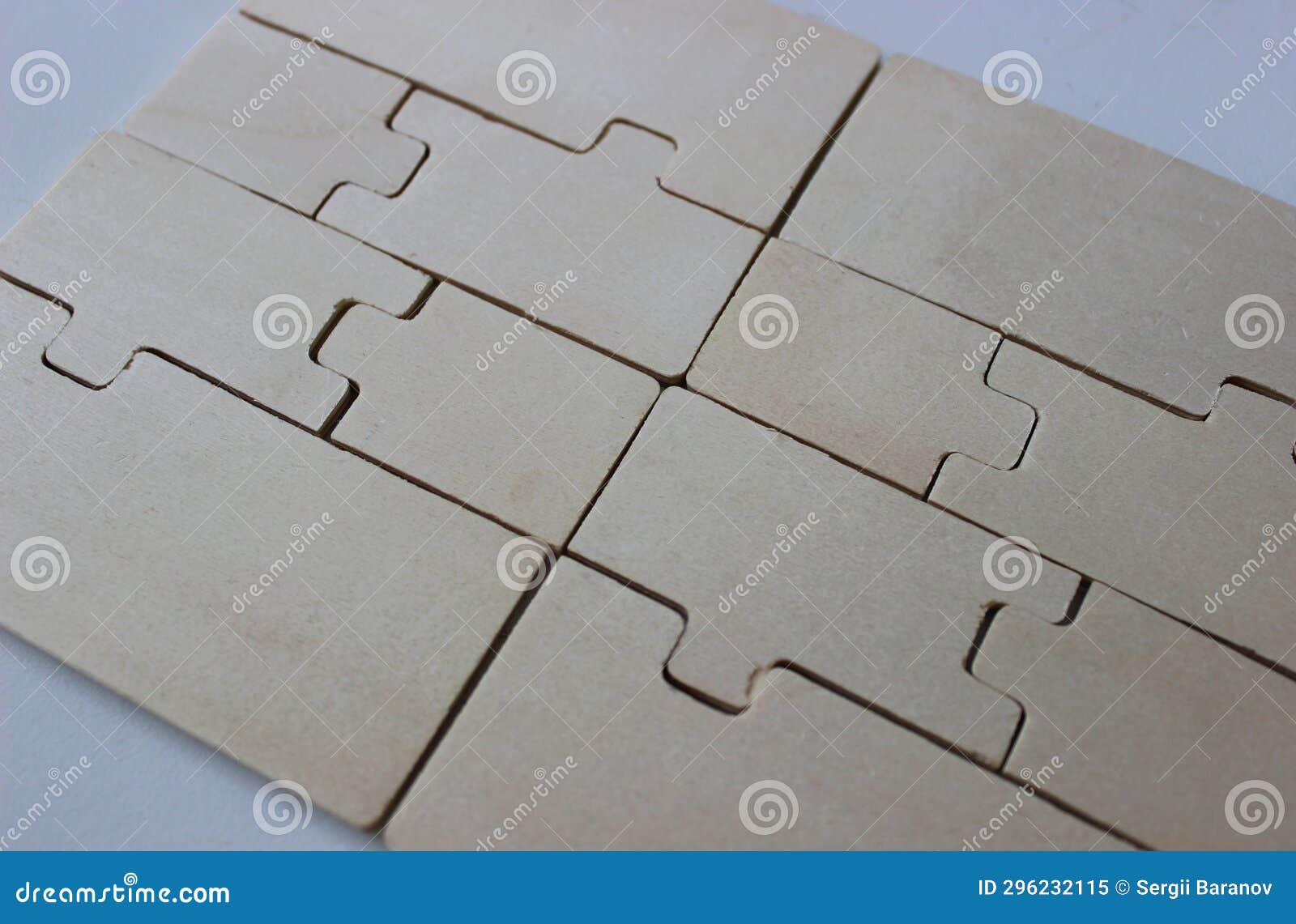 Rectangular Panel of Tightly Folded Plywood Puzzles on a White Surface ...