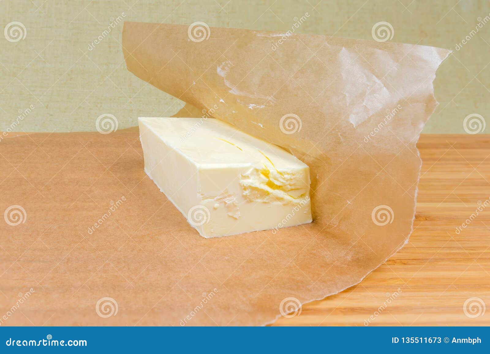 Piece of Solid Butter on Waxed Paper on Wooden Surface Stock Image ...