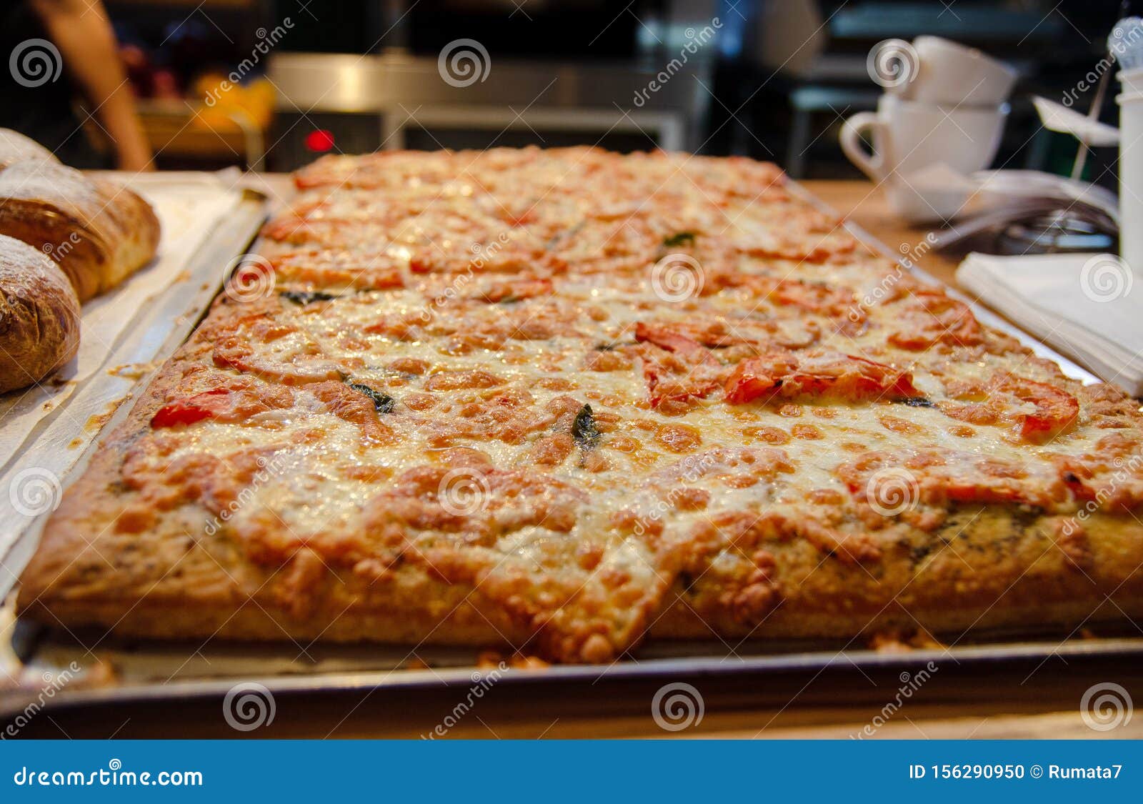 Fresh Pizza on Tray for Sale at Small Cafe Stock Photo - Image of ...