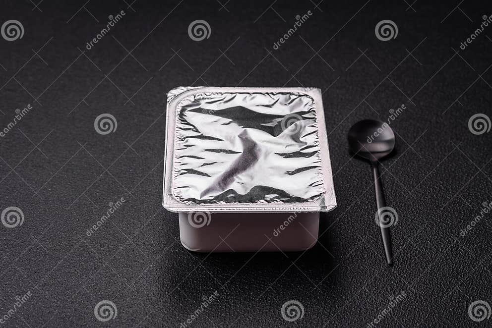 Rectangular Plastic Box with Yogurt or Cheese Hermetically Sealed with ...