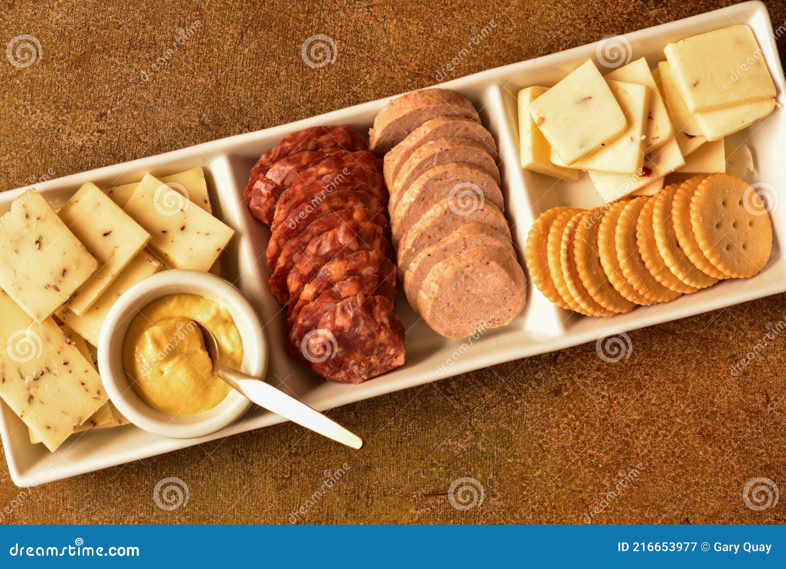 Rectangular Serving Plate of Cheese, Crackers, Meats, and Mustard ...