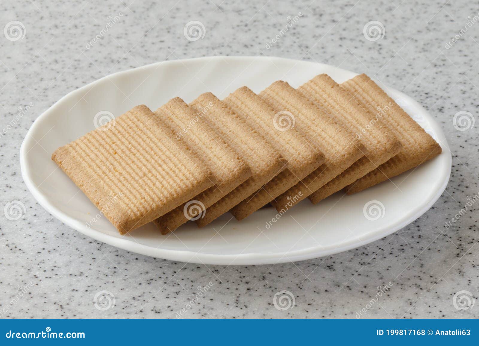 Rectangular Shortbread Cookies and Chocolates in a White Plate on a ...