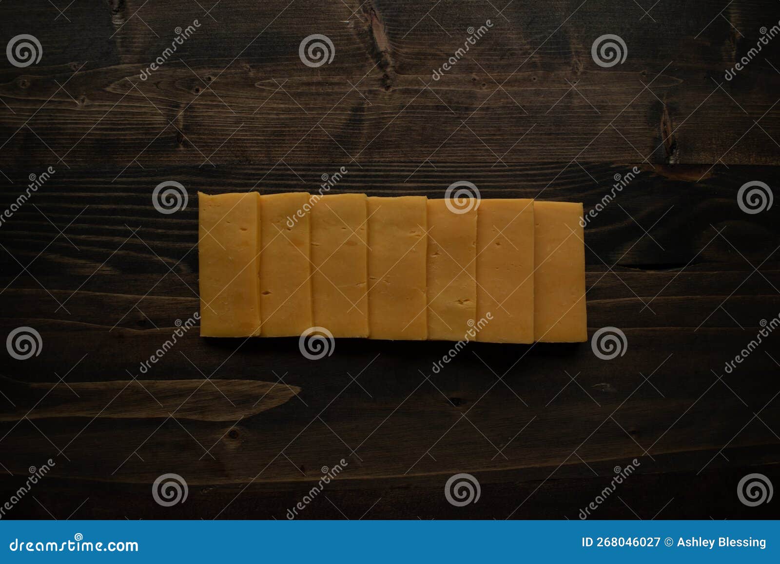 Slices of Cheddar Cheese on Rustic Wood Charcuterie Board Stock Image ...