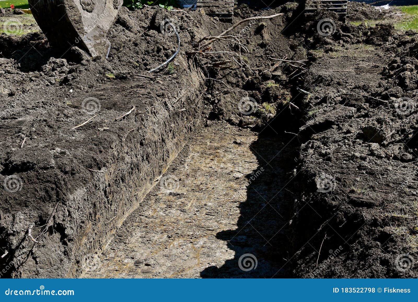 Trench Digging for the Placement of a Garage Footing. Stock Photo ...
