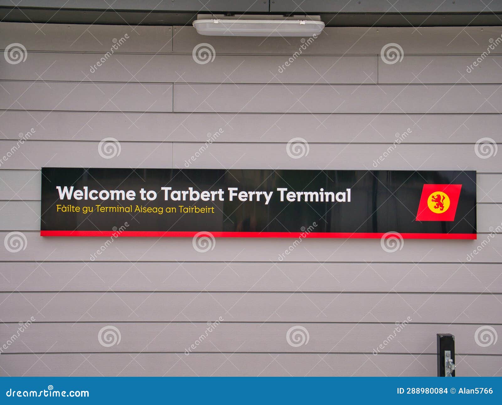 A Rectangular Welcome Sign with Corporate Logo at the Tarbert Ferry ...