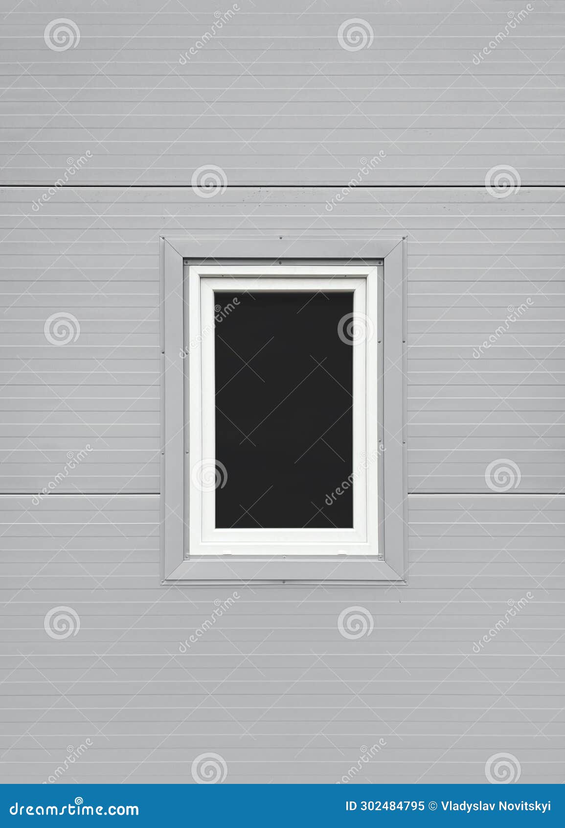 Rectangular Window in a White Frame on the Facade of an Industrial Gray ...