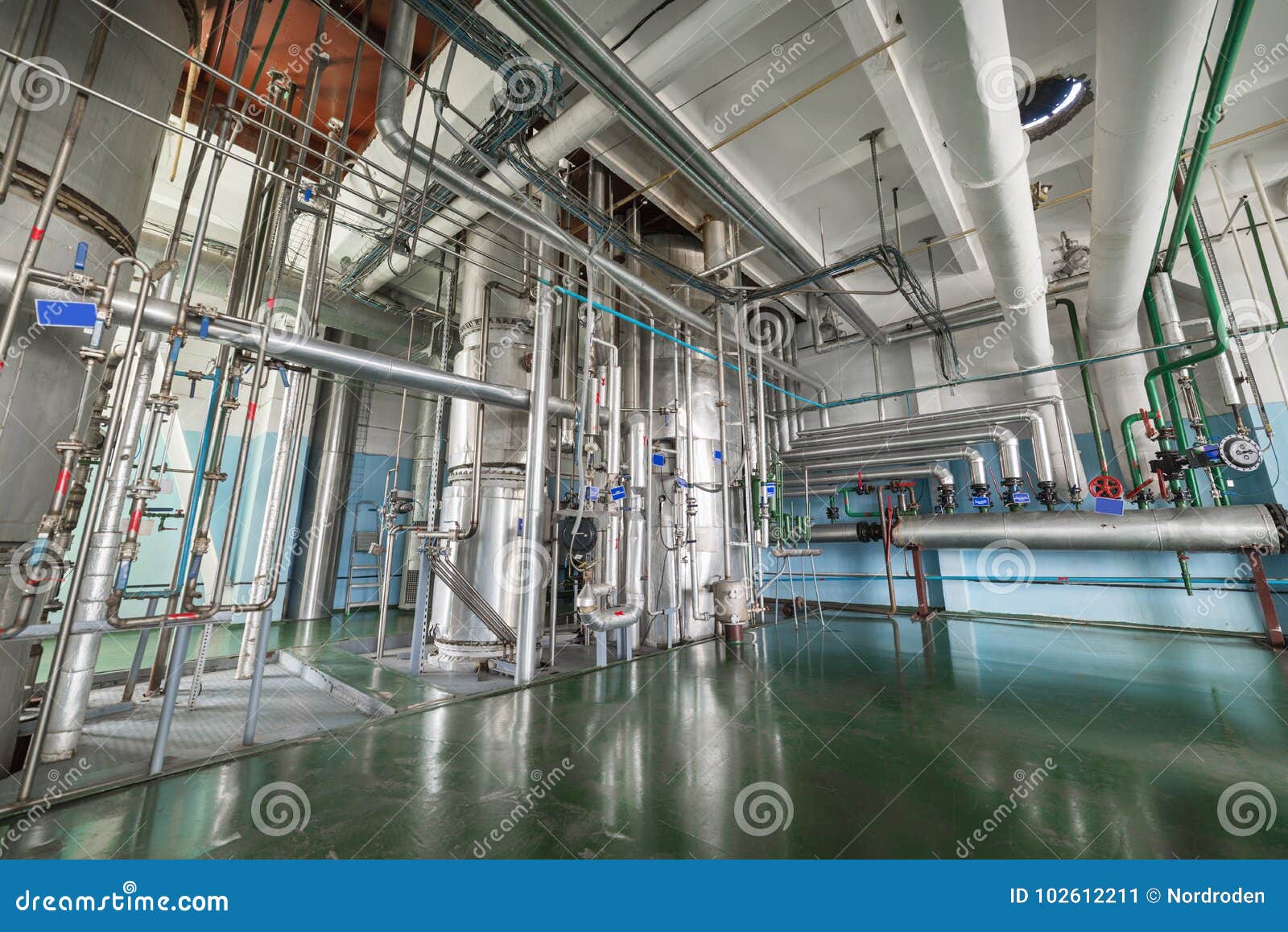 The Rectification Shop. Silvery Distillation Columns Stock Image ...