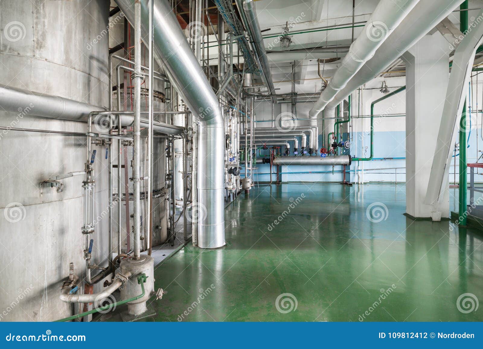 The Rectification Shop. Silvery Distillation Columns Stock Photo ...