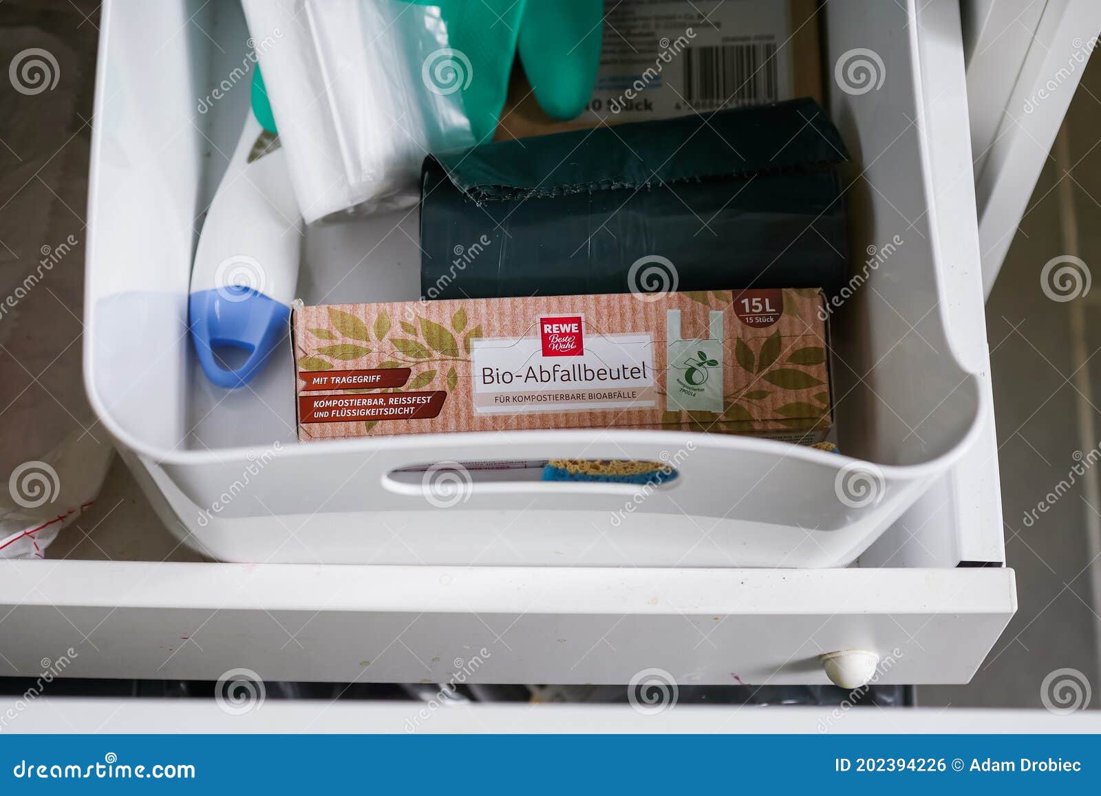 Recyclable Garbage Bag Container Inside Box with Household Objects ...