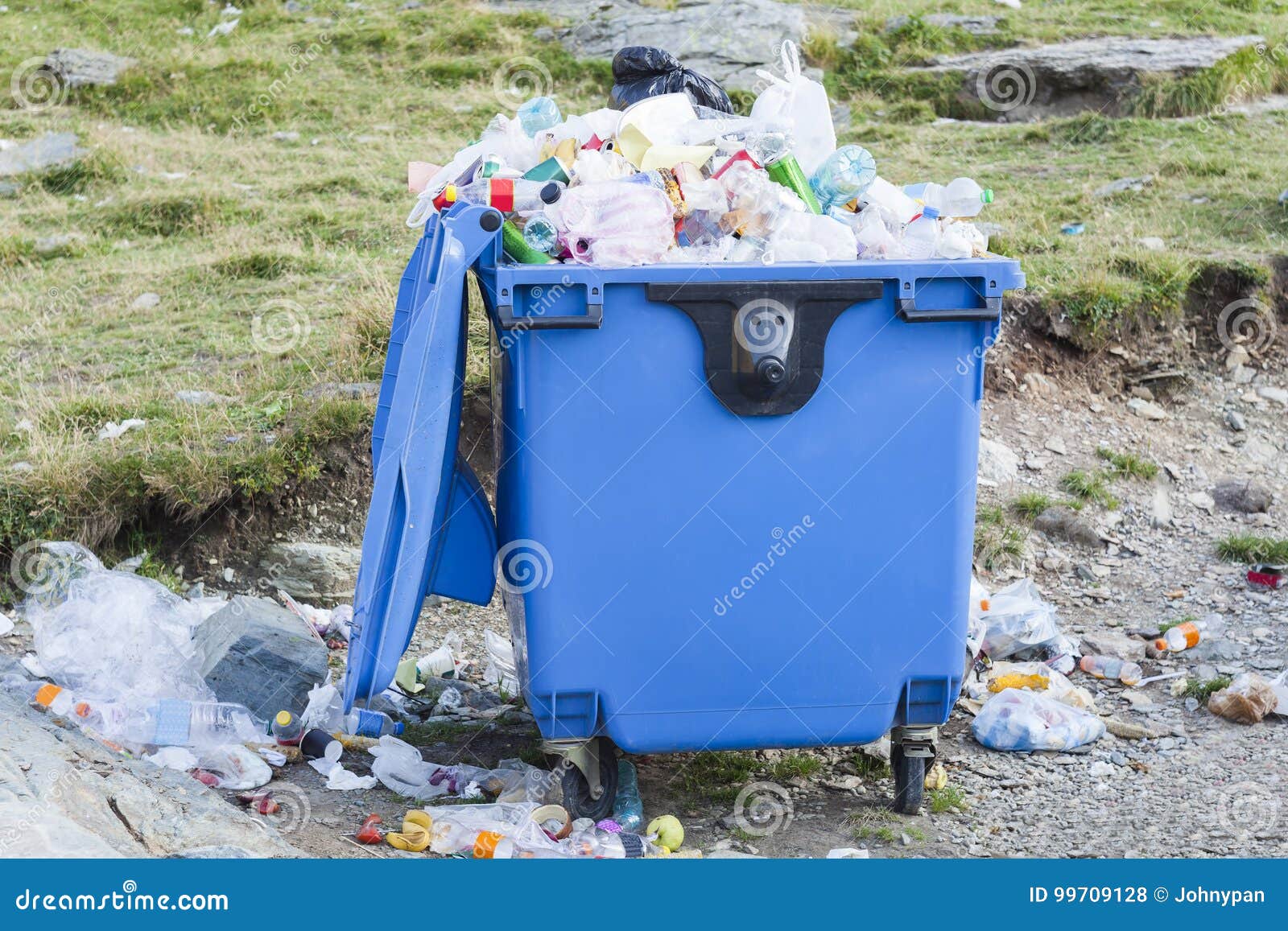Recycle Bin Full of Garbage Stock Photo - Image of bottle, paper: 99709128