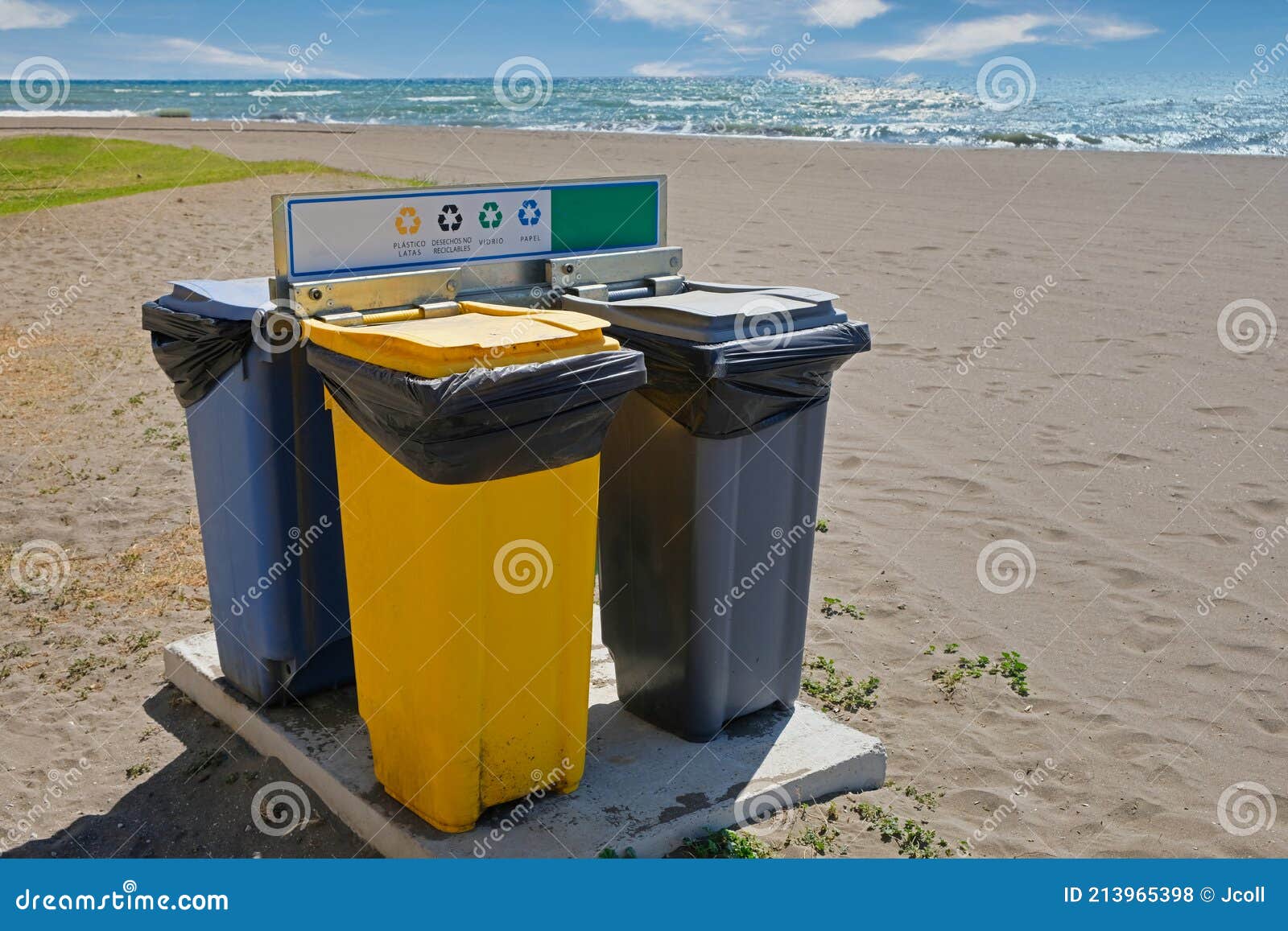Recycle Bins in a beach stock photo. Image of park, ecology - 213965398