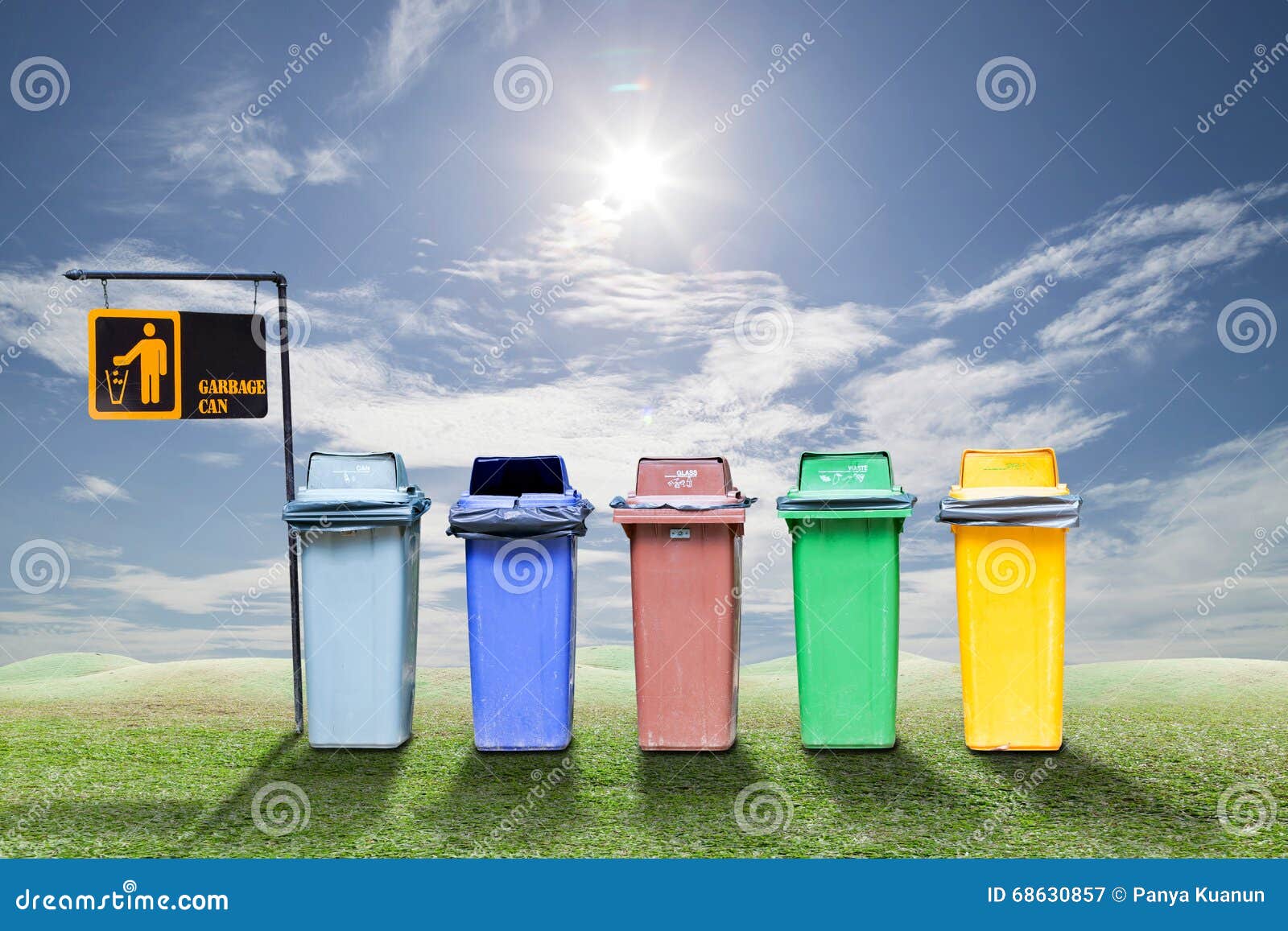 Recycle Bins on Green Grass and Sky Background ,ecology Concept. Stock ...