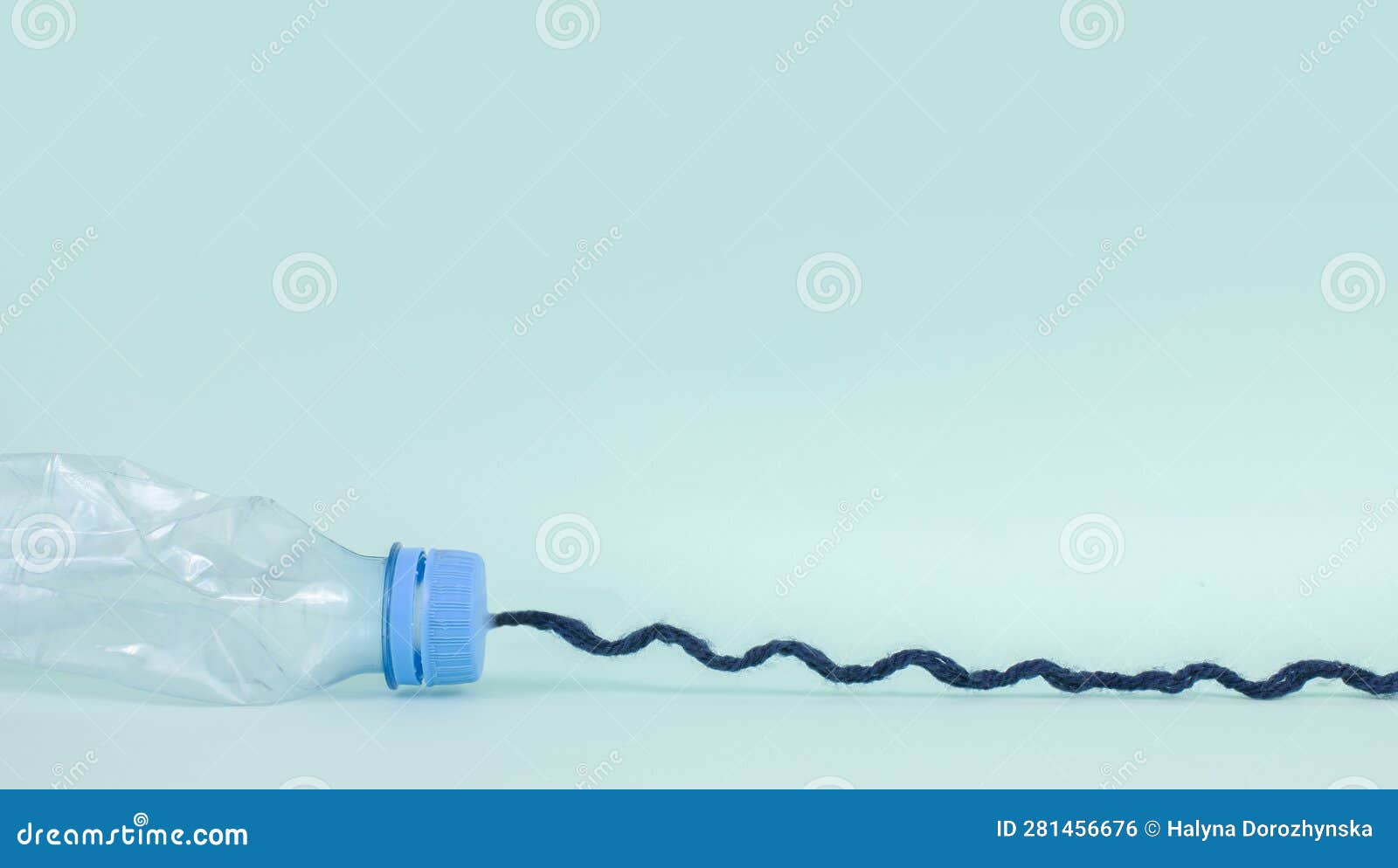 Recycled Polyester Concept. a Plastic Bottle Turns into a Thread Stock ...