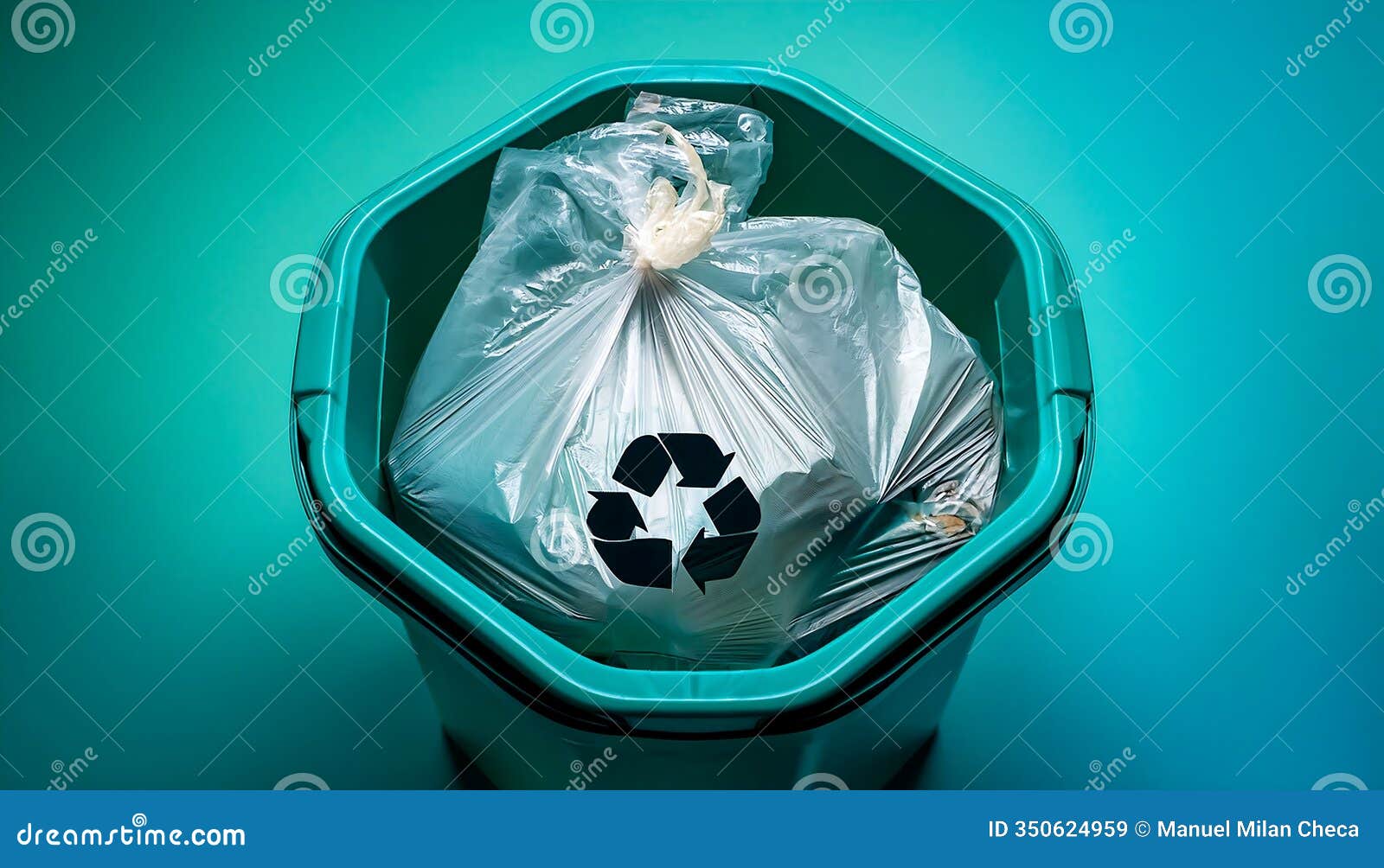 A Recycling Bin Filled with a Plastic Rubbish Bag Highlights ...