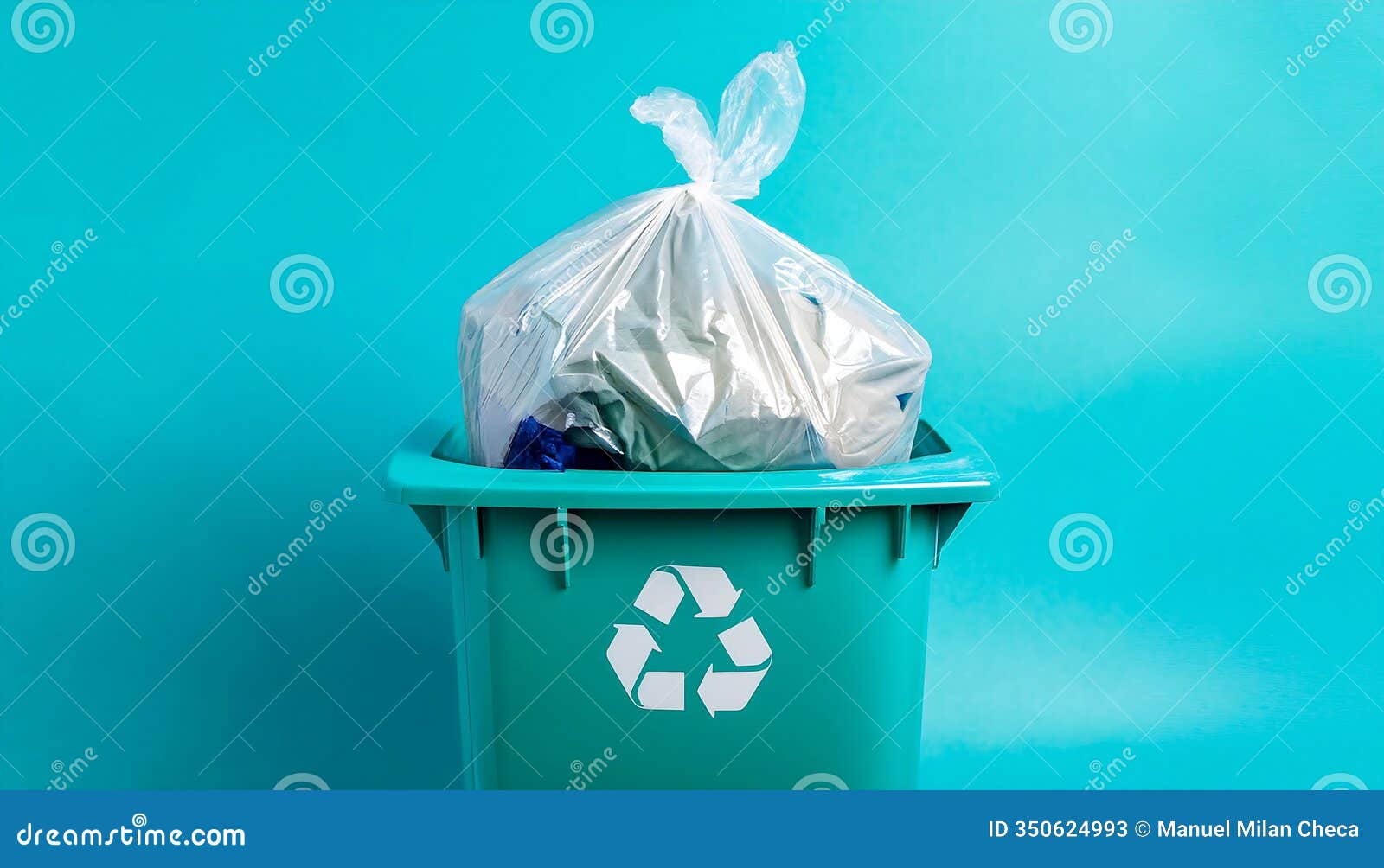 A Recycling Bin Filled with a Plastic Rubbish Bag Highlights ...