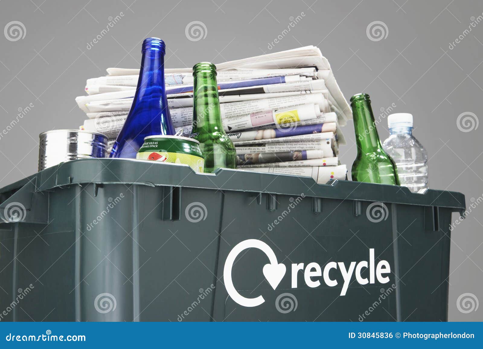 Recycling Bin Filled with Waste Paper and Bottles Close-up Stock Photo ...