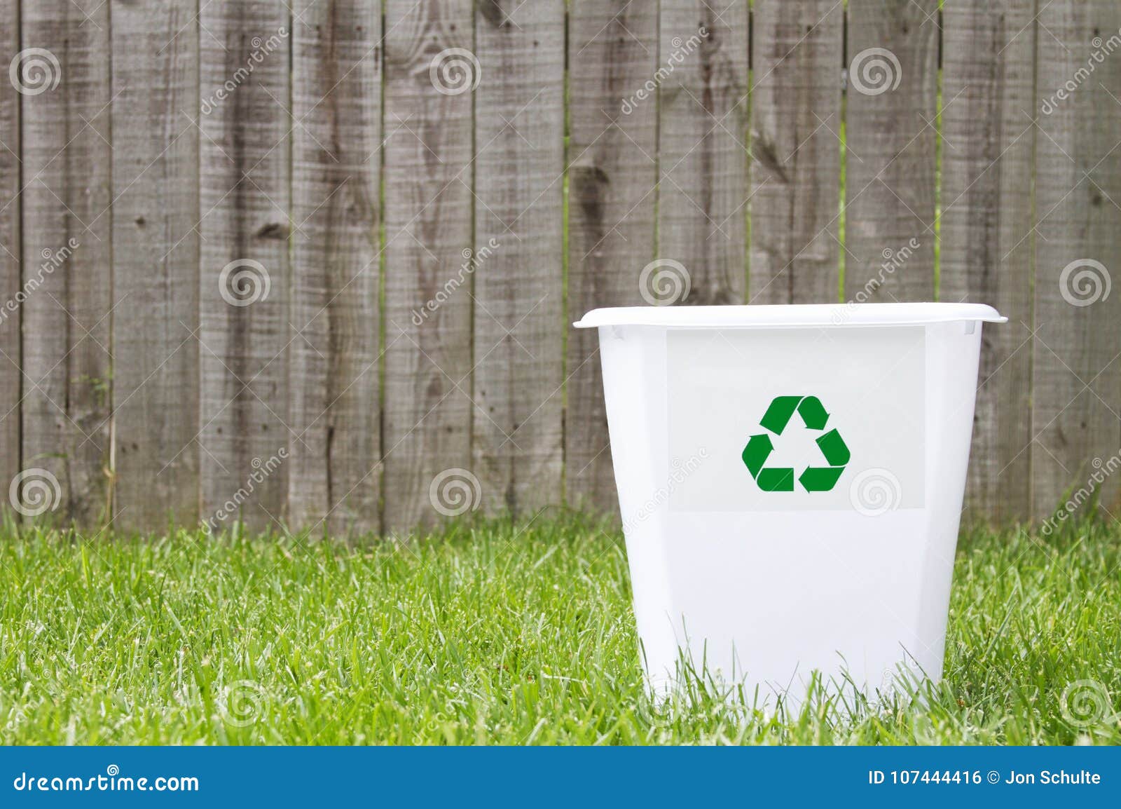 A recycling bin outside stock photo. Image of environment - 107444416