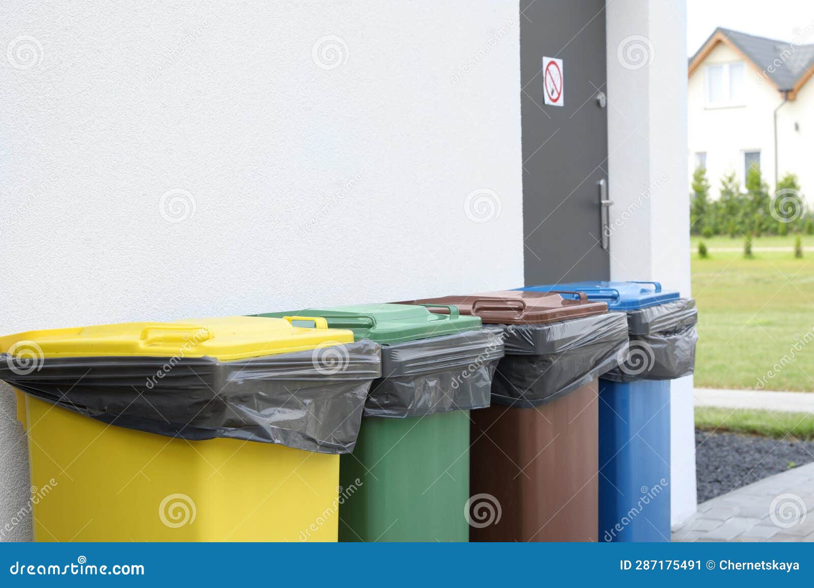 Recycling Bins for Different Garbage Outdoors. Waste Sorting Stock ...
