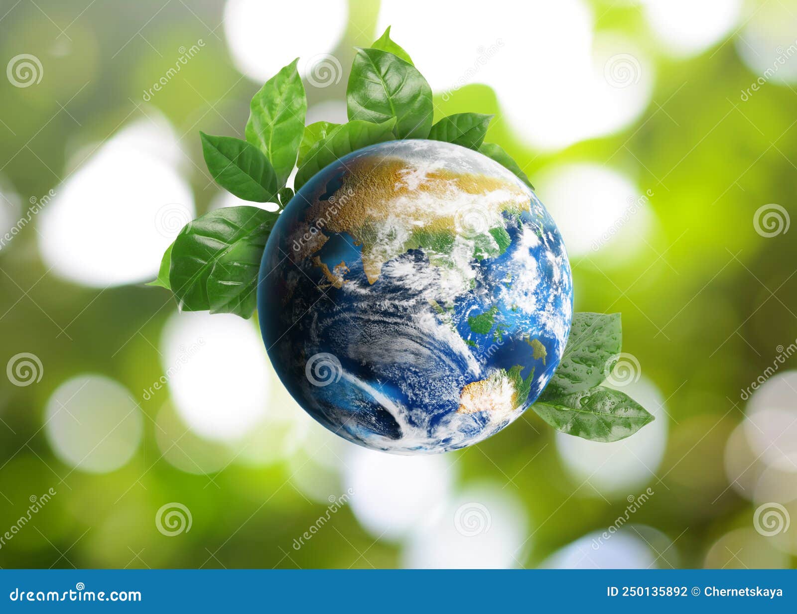 Recycling Concept. Earth Planet with Green Leaves on Blurred Background ...
