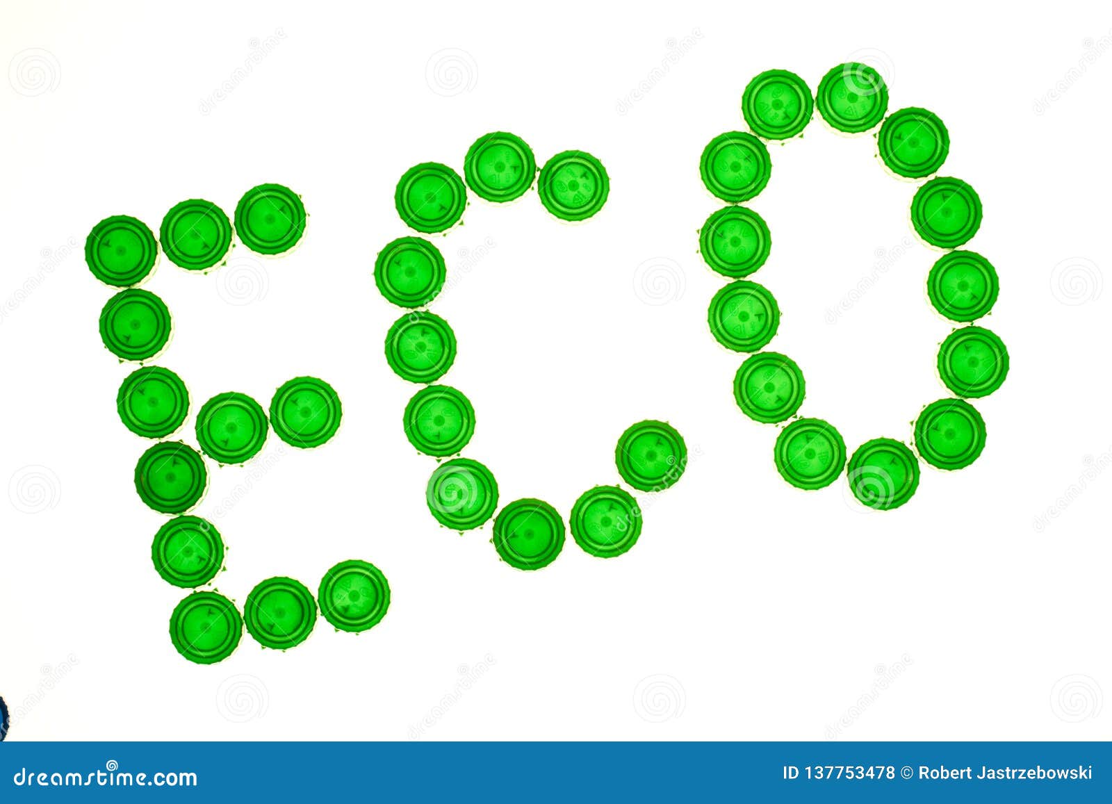 Recycling Concept with Eco Caption Made of Green Plastic Bottle Caps ...