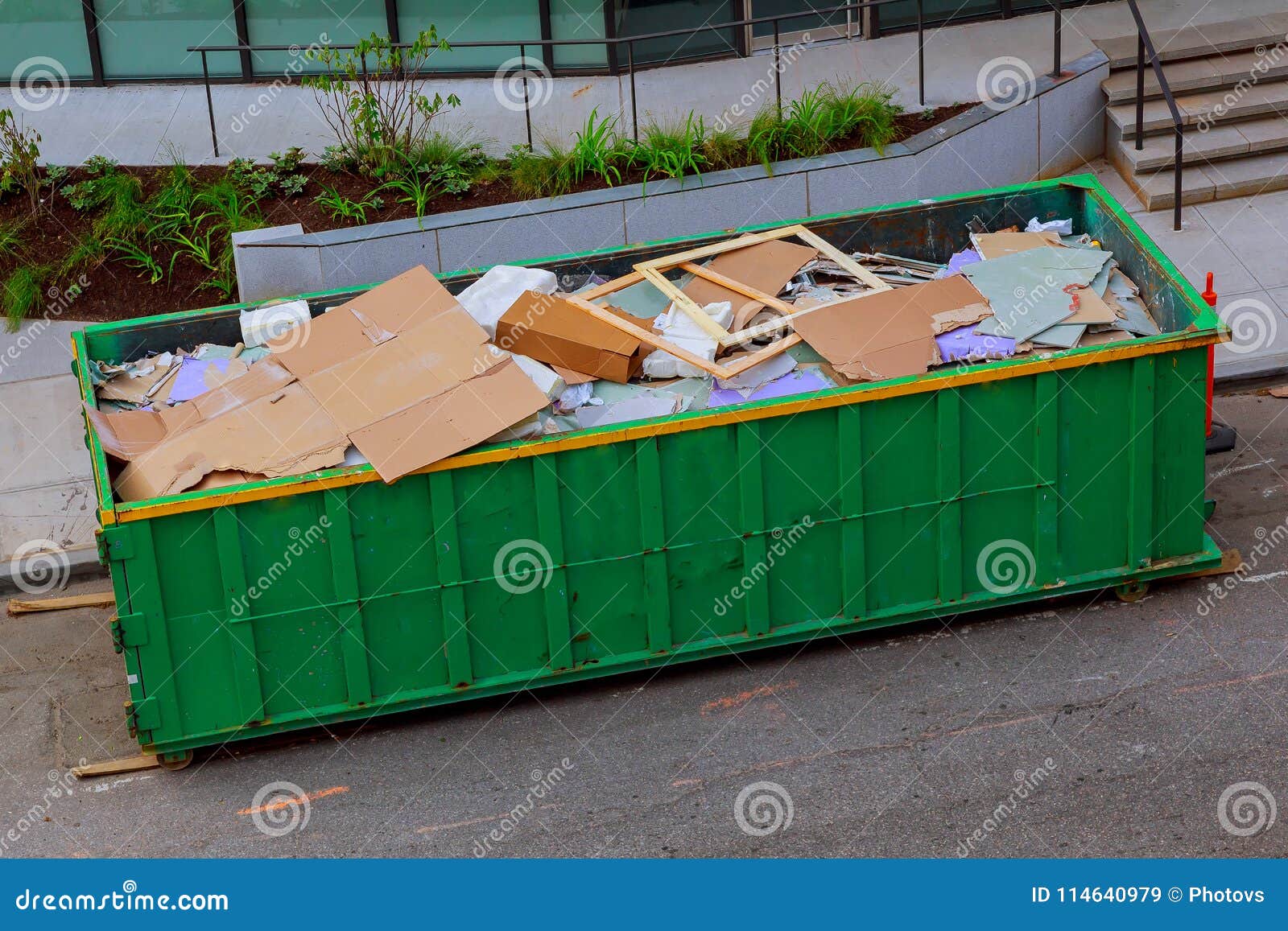 Container Trash Bin For Recycling With City Background. Green, Yellow ...