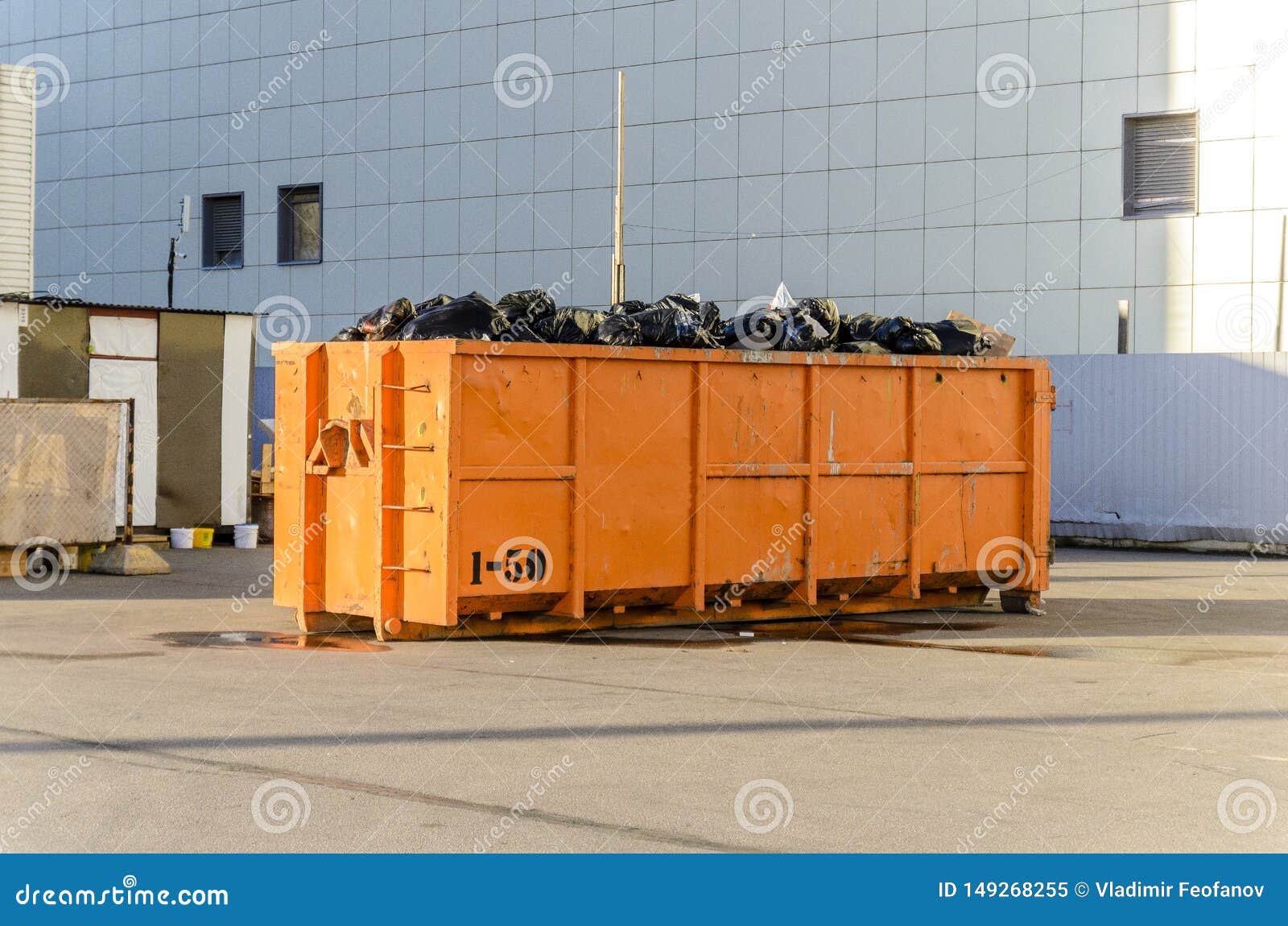 Recycling of Garbage and Waste, a Large Orange Container for Waste of a ...