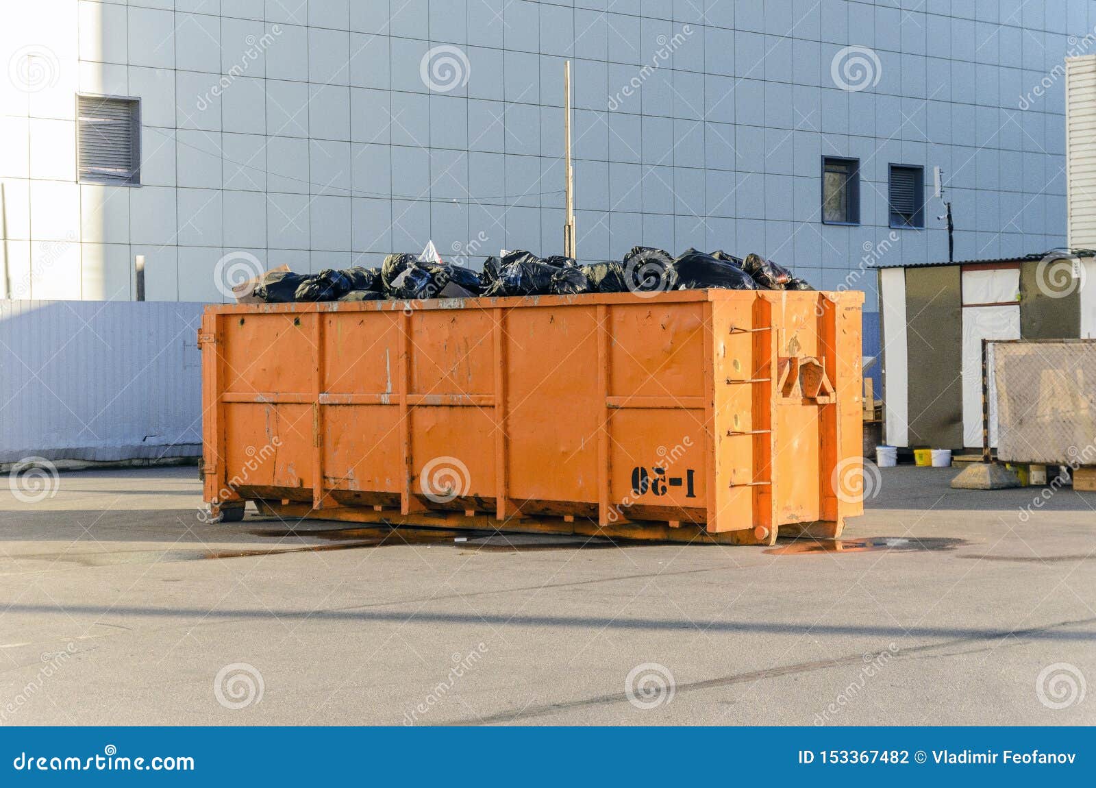 Recycling of Garbage and Waste, a Large Orange Container for Waste of a ...