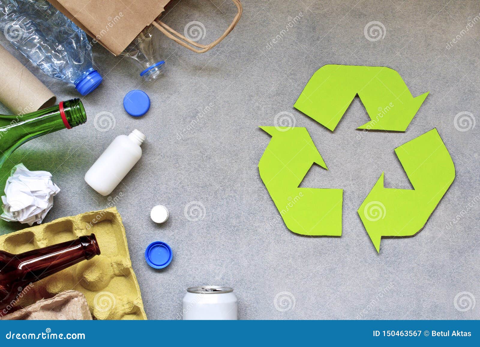 Recycling Symbol And Different Garbage On Gray Background. Stock Image ...
