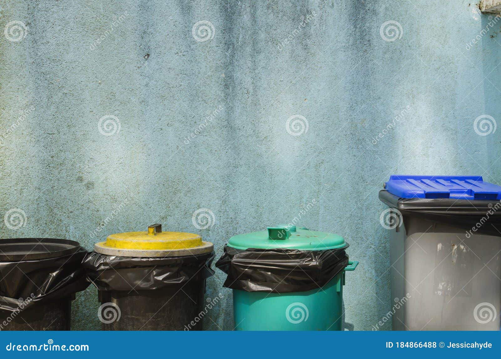 Different Colored Trash Bins for Separate Waste in the Street ...