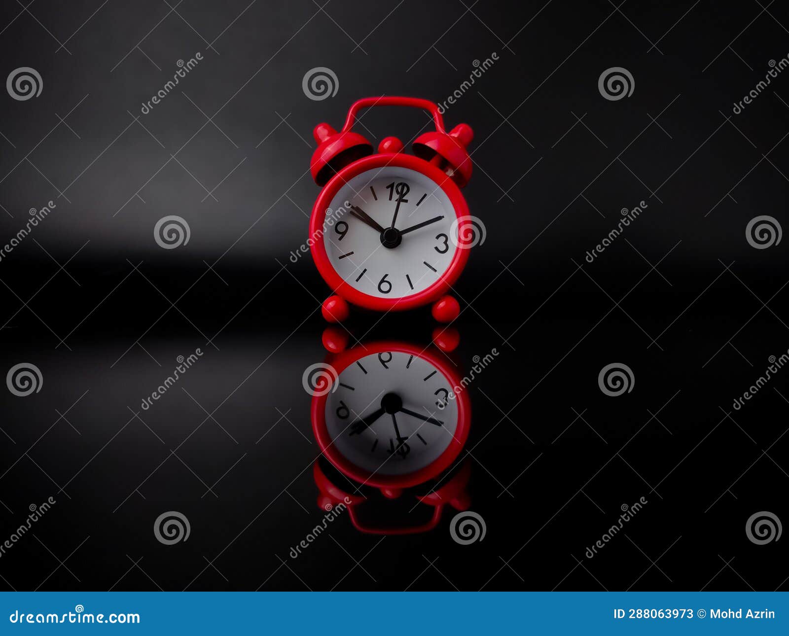 Red Alarm Clock on Black Background with Reflection Stock Image - Image ...