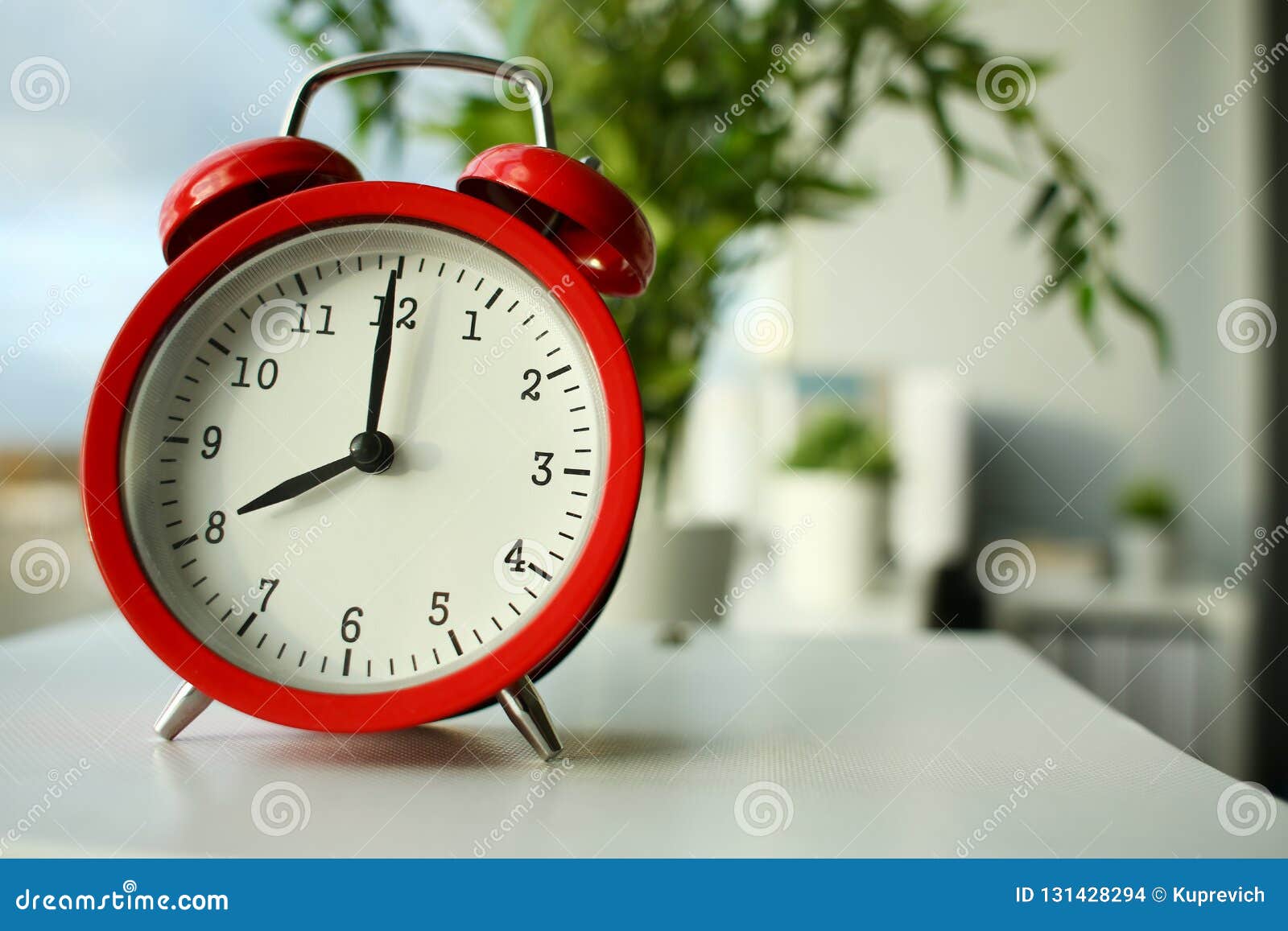 Red Alarm Clock Set at Seven in the Morning Stock Photo - Image of ...