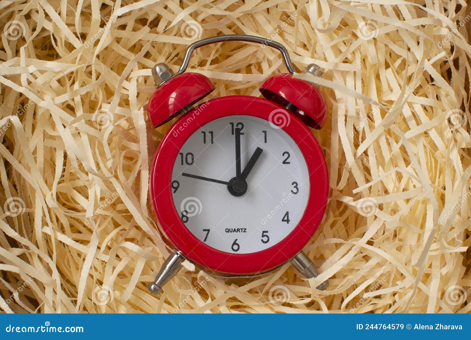 Round Red Alarm Clock in Wood Shavings Stock Image - Image of morning ... Round Red Alarm Clock in Wood Shavings Stock Image - Image of morning ...