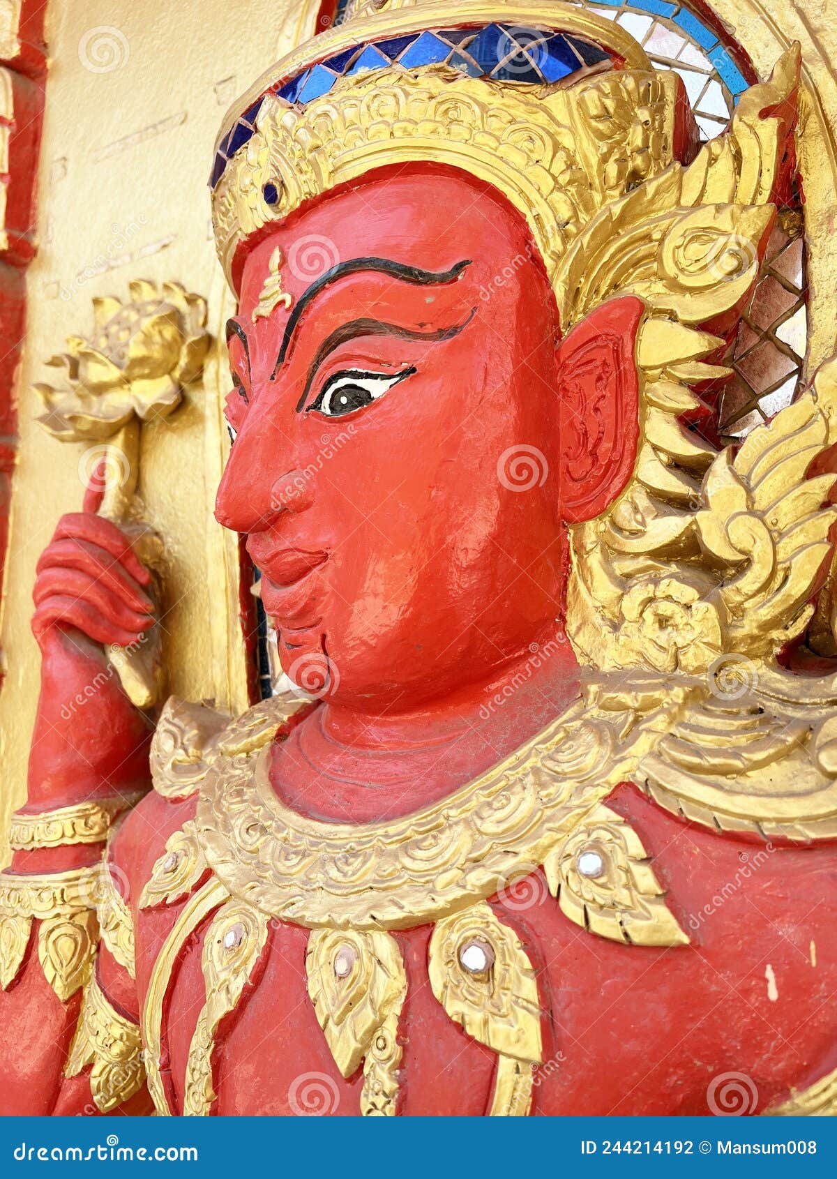 Red Angle Statue on Golden Wall Stock Photo - Image of culture, statue ...