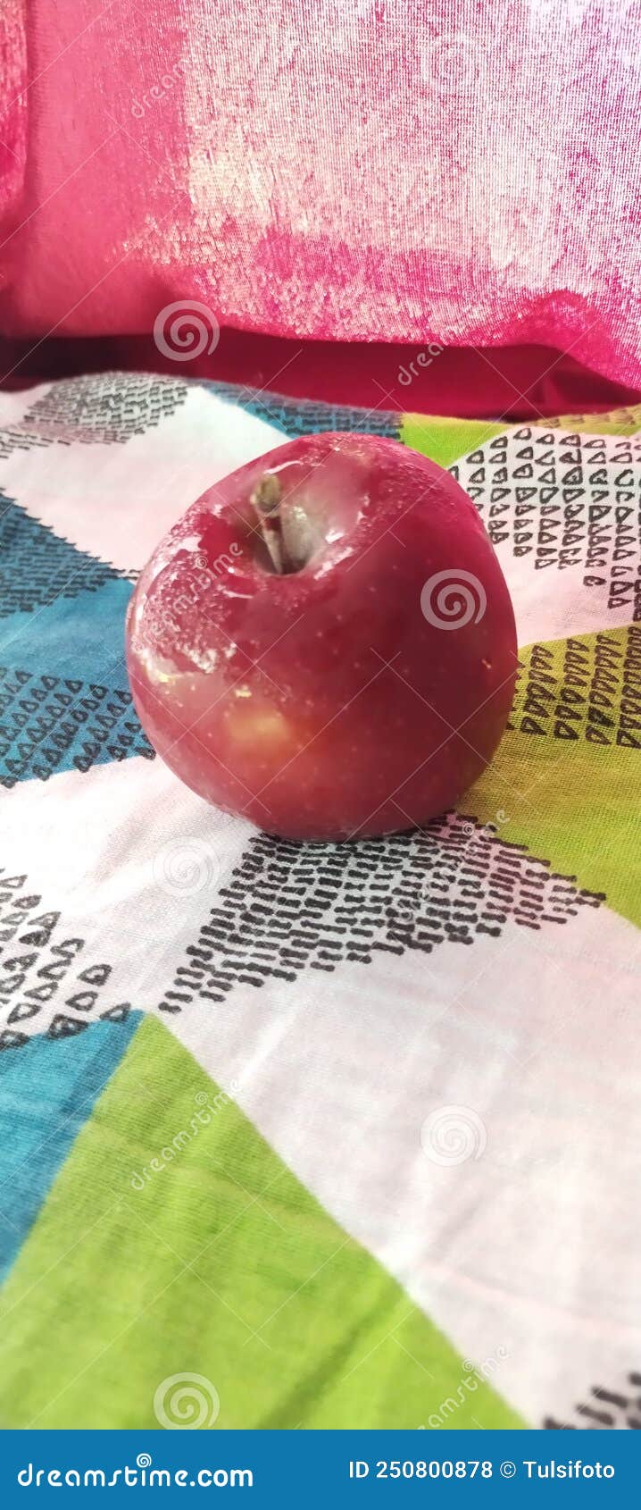 Red Apple on Bed stock photo. Image of fruit, alone - 250800878