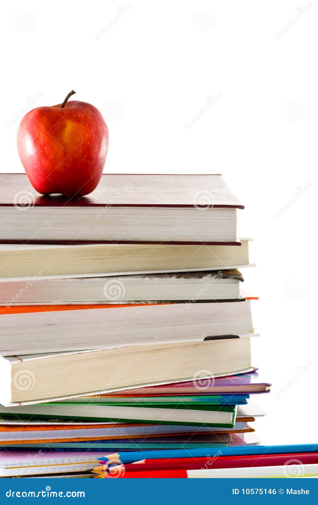 Red apple on book stock photo. Image of college, apple - 10575146