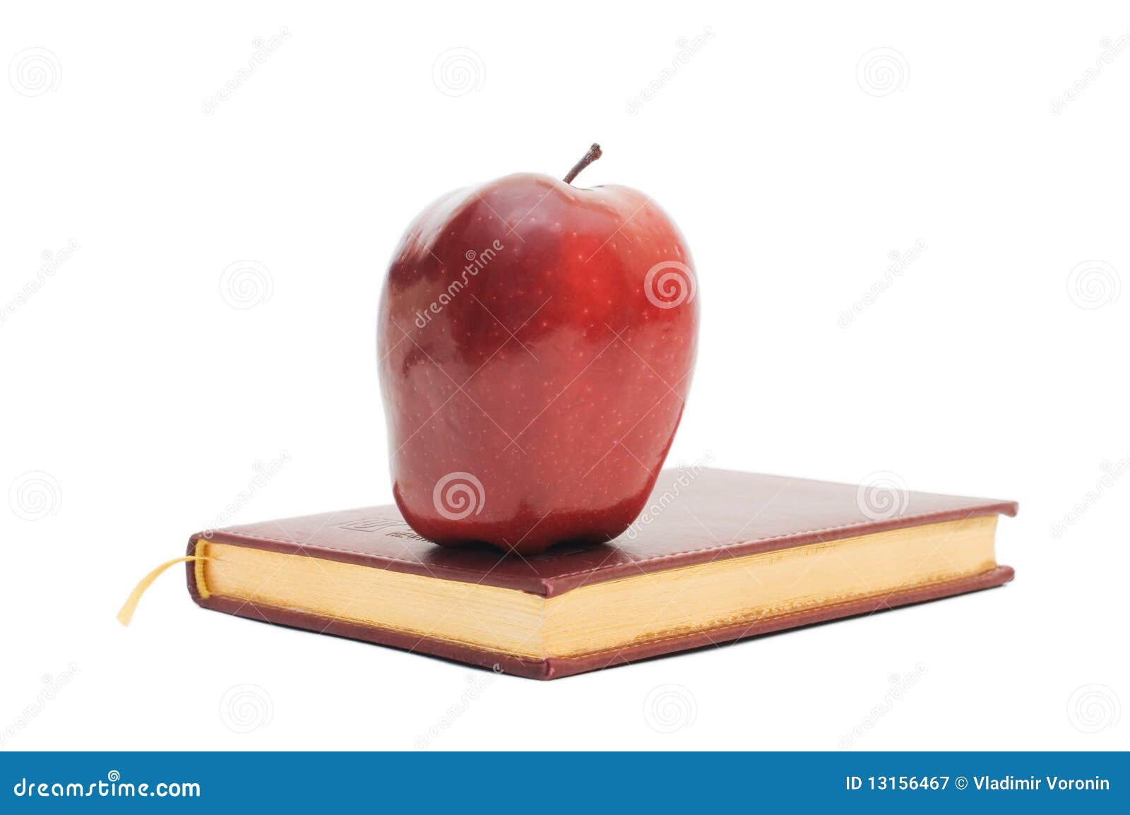 Red apple on the book stock image. Image of green, leaf - 13156467