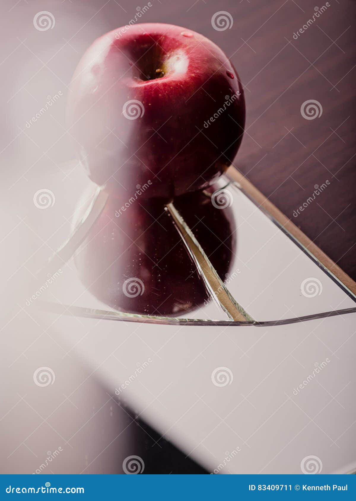 Red apple on broken mirror stock image. Image of destruction - 83409711