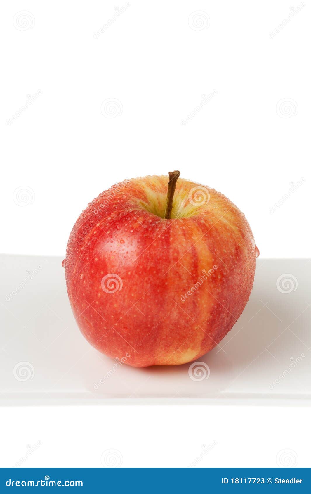 Red Apple Closeup on White Plate Stock Image - Image of white, ripe ...
