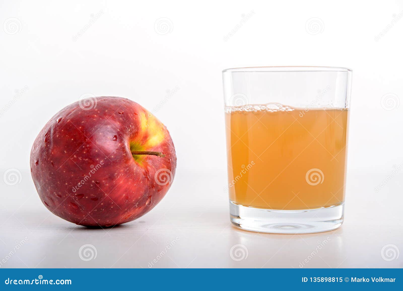 Red Apple with Glass of Naturally Cloudy Juice Stock Image - Image of ...