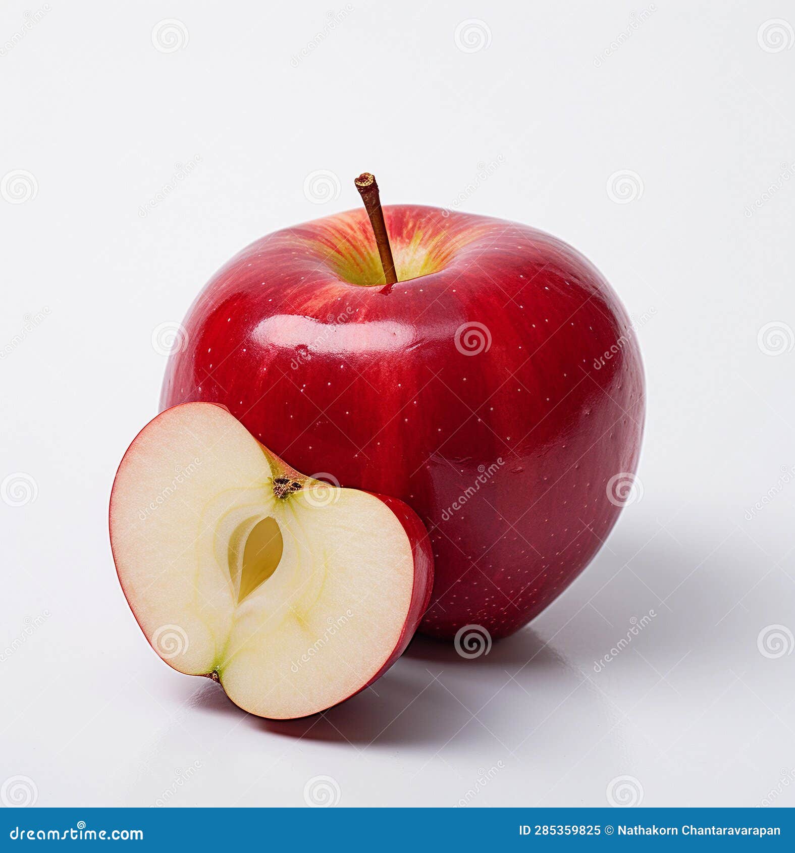 A Red Apple with Half Cut Open and Leaf in the Rind Stock Image - Image ...