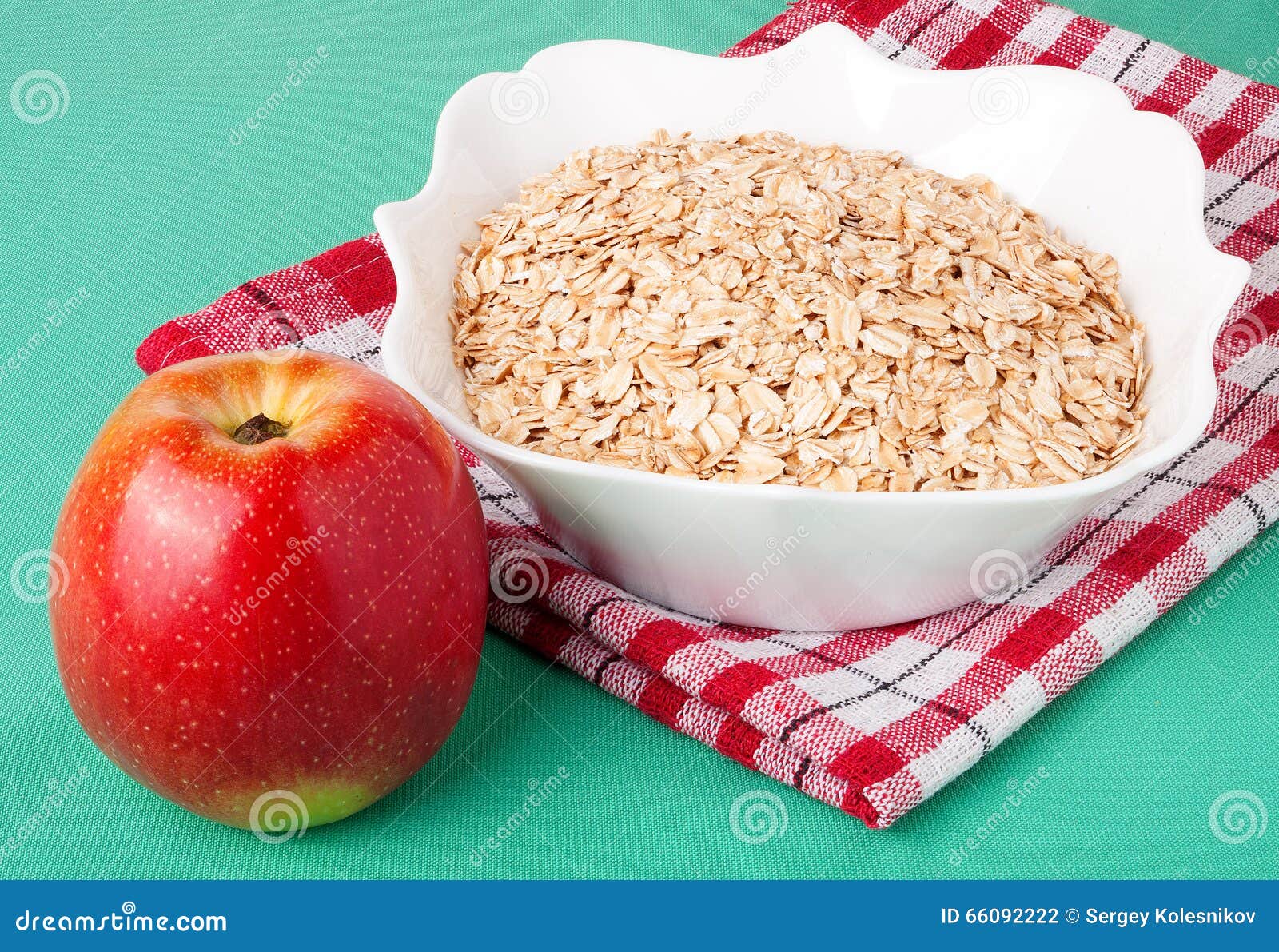 Red Apple and Oat Flakes in a Bowl Stock Photo - Image of life, napkin ...