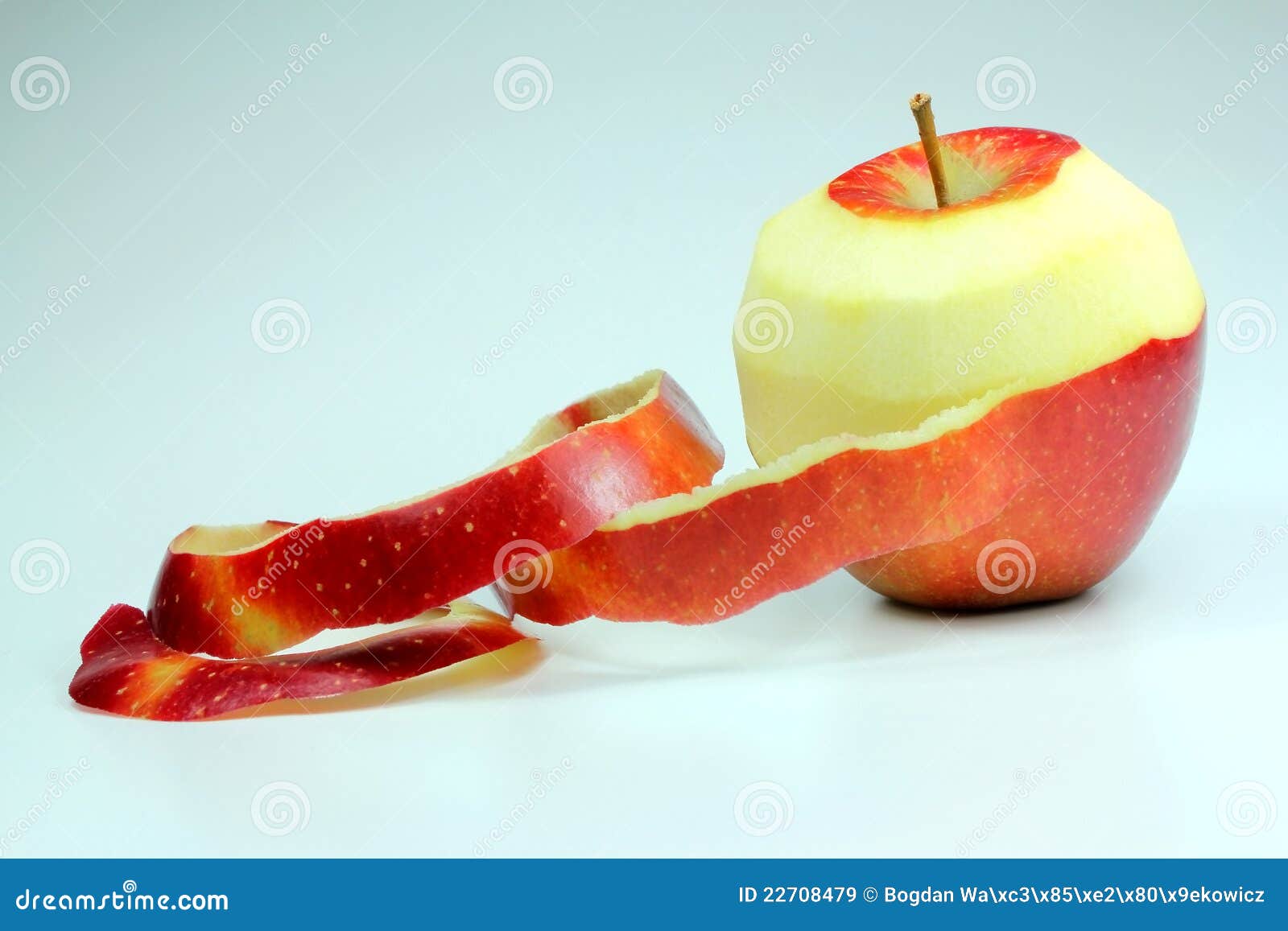 Red apple with peeled skin stock image. Image of peel - 22708479