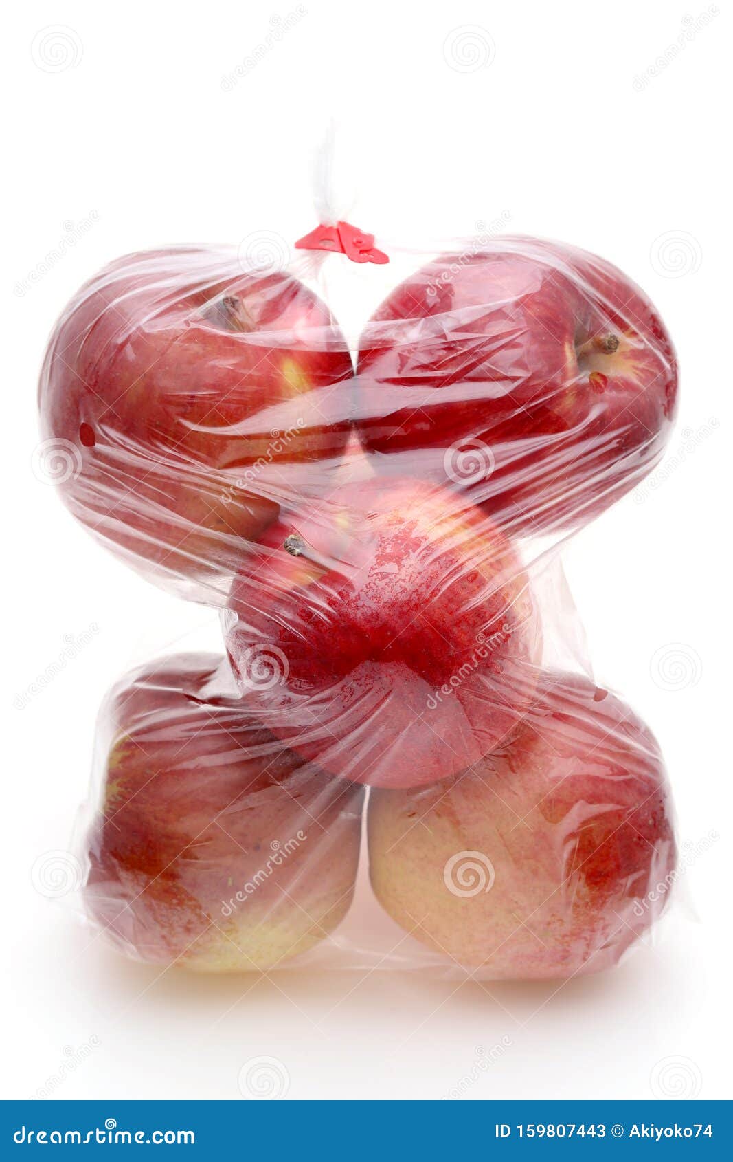 Red apple in a plastic bag stock image. Image of food - 159807443