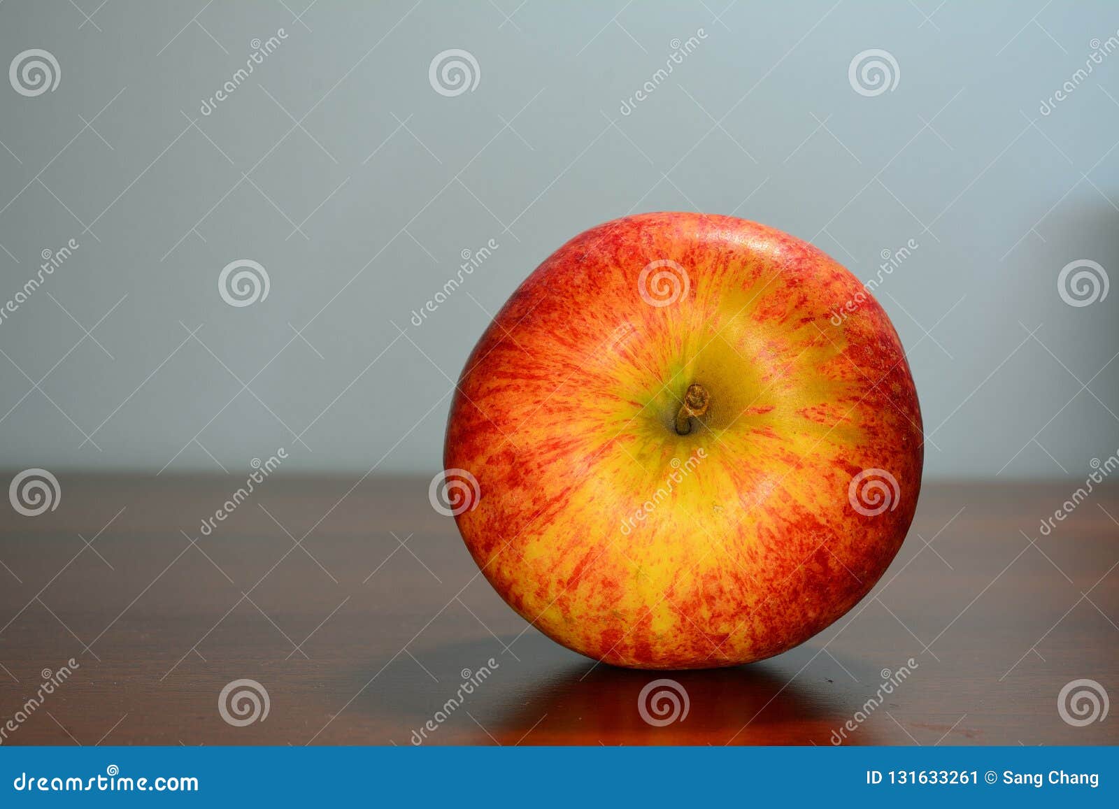 Red Apple Showing Radiation Pattern on Tabletop Stock Image - Image of ...