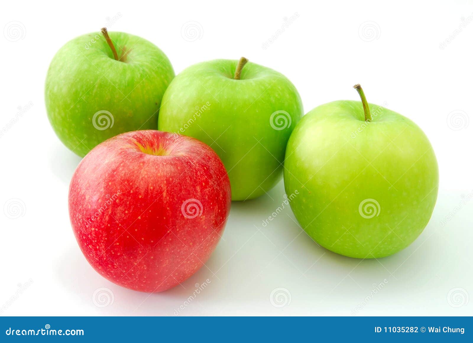 Red Apple Standing Out from the Crowd Stock Photo - Image of ...