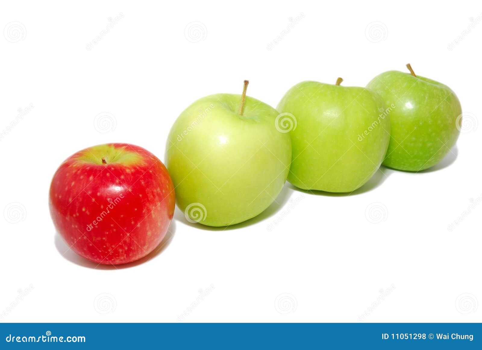 Red Apple Standing Out from the Crowd Stock Photo - Image of ...